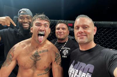 ‘Big Firi’ claims second MMA belt | In the Game | ledger.news