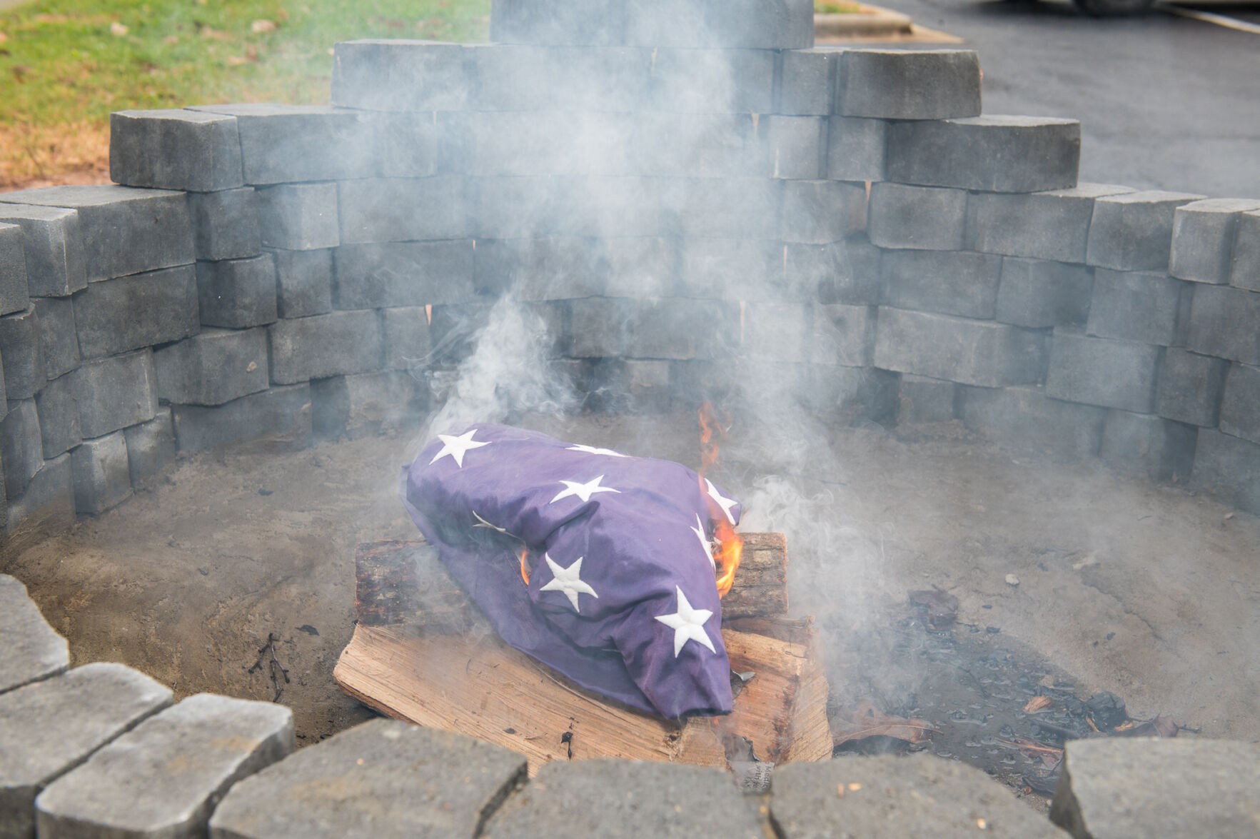 Local Boy Scout builds flag retirement pit at Boger City FD | News ...