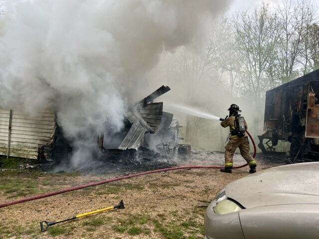 Highway 58 Volunteer Fire crews rescue dog from burning camper on ...