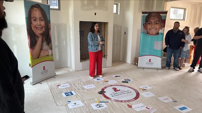 Floor signing marks milestone for St. Jude's 2026 dream home | Local ...