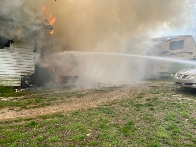 Highway 58 Volunteer Fire crews rescue dog from burning camper on ...