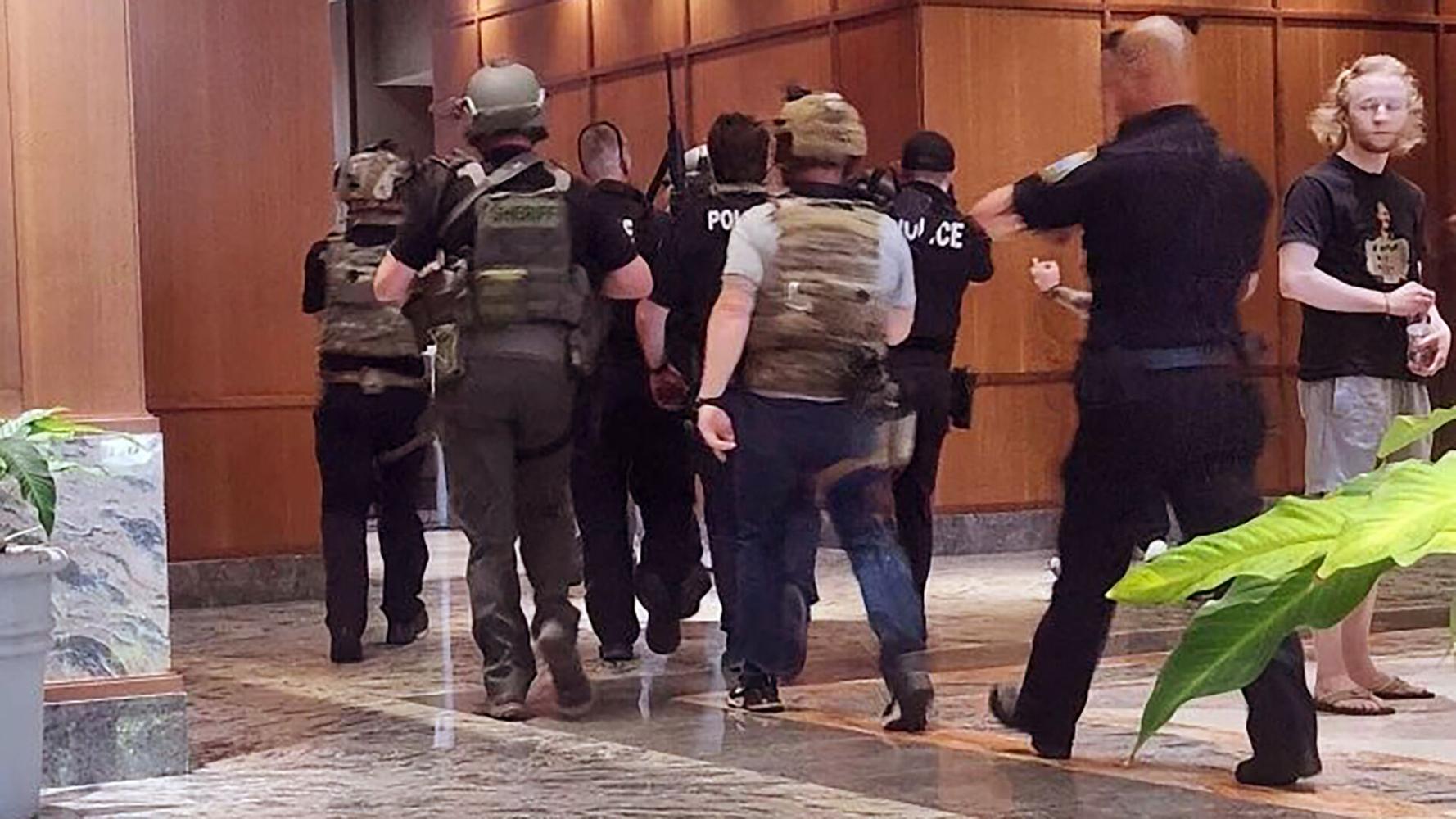 UPDATE: Autopsy report says active shooter suspect died by suicide ...