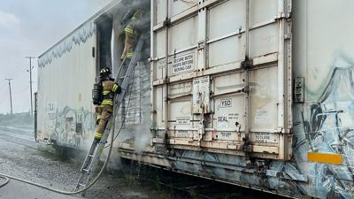 Train car carrying potatoes catches fire inside maintenance shop ...
