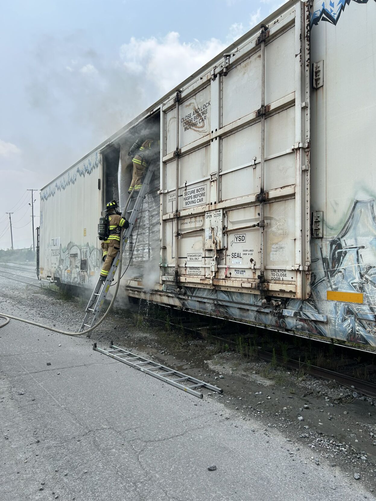 Train car carrying potatoes catches fire inside maintenance shop ...