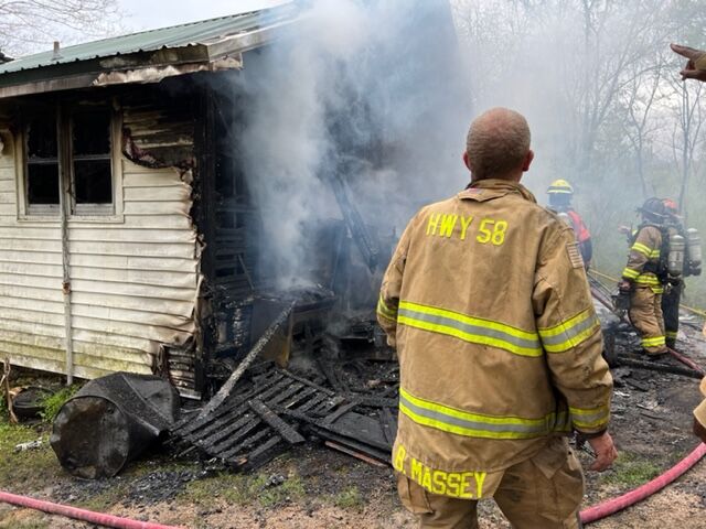 Highway 58 Volunteer Fire crews rescue dog from burning camper on ...