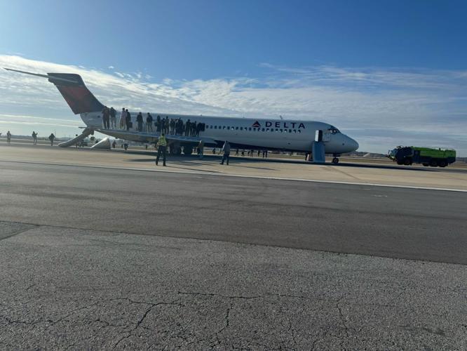 A Delta flight from Atlanta was forced to turn around and evacuate ...