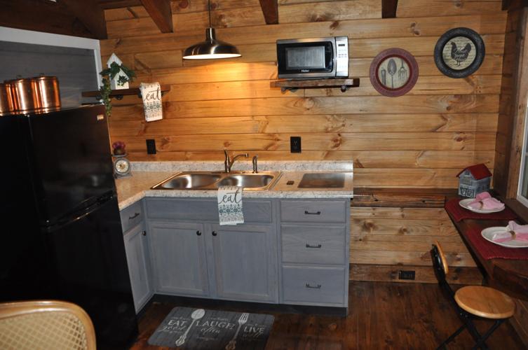 Log cabin company opens in Mingo County | Features | loganbanner.com