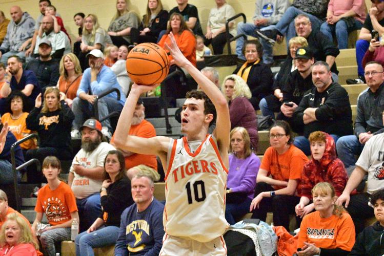 Tigers hold off Logan 66-56, sweep season series | Sports | loganbanner.com