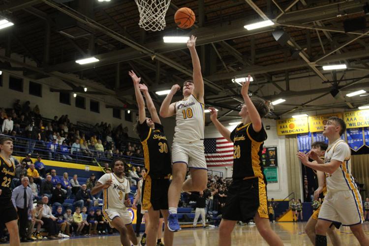 Prep boys basketball: Logan storms back to edge No. 8 Scott 70-68 ...