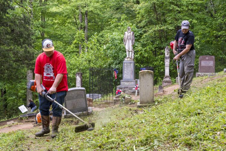 Volunteers, including McCoy descendants, help clean up Hatfield Cemetery at Sarah Ann | News ...