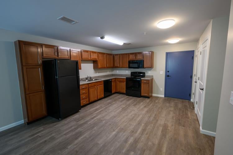 Ribbon cut to Loganwood apartments | News | loganbanner.com