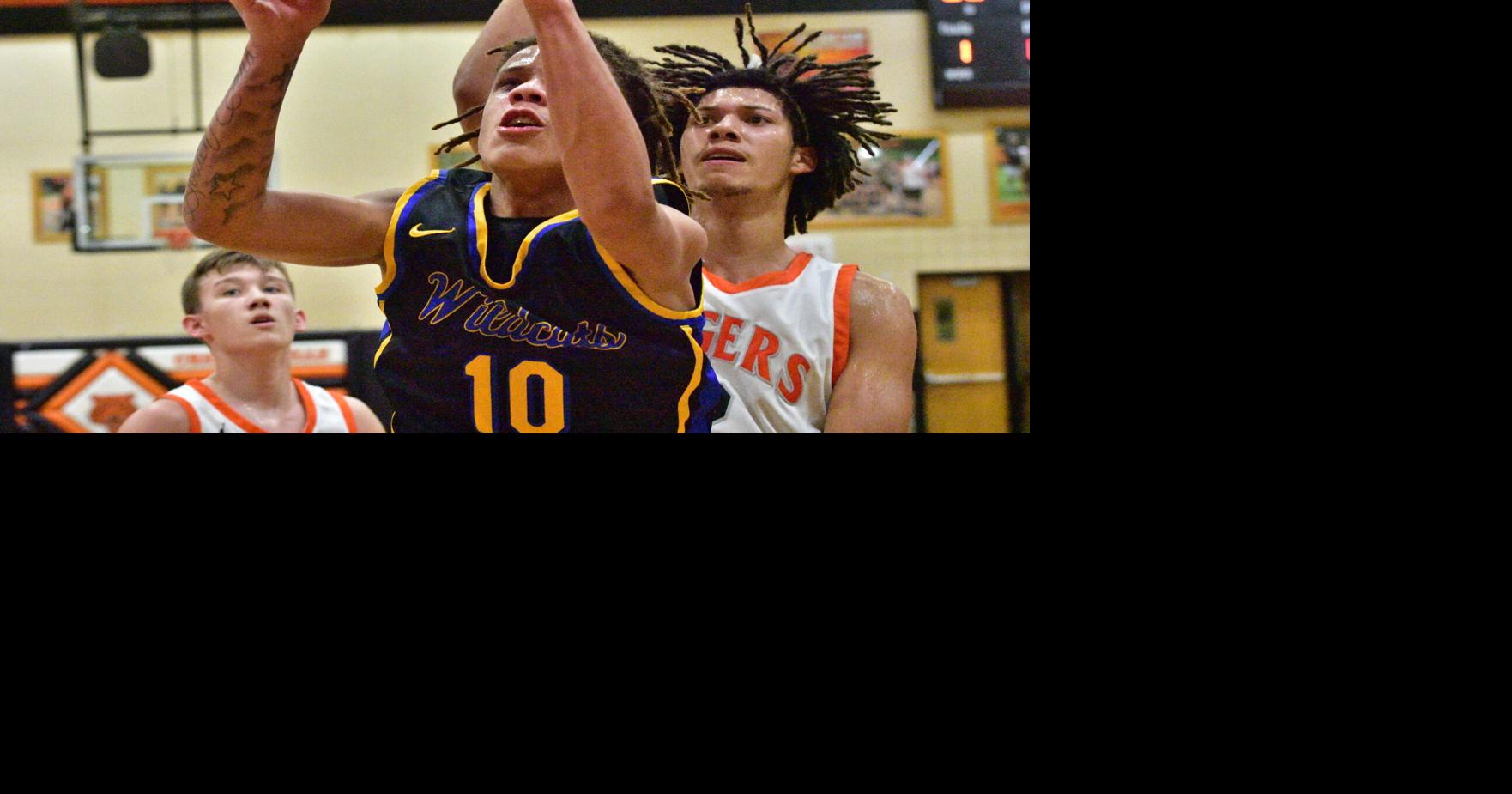 Tigers hold off Logan 66-56, sweep season series | Sports | loganbanner.com