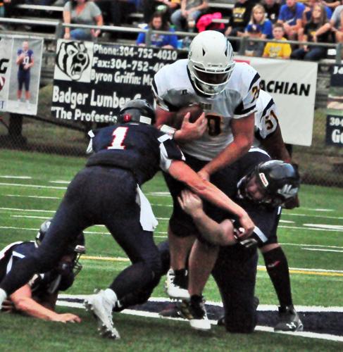 Photos: Man 62, Logan 8 (High School Football) | Photos | loganbanner.com