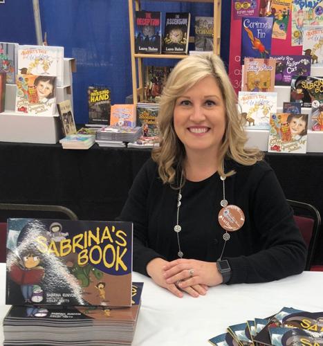 Runyon publishes award-winning children's book | News | loganbanner.com