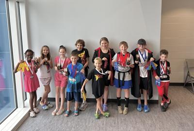Logan USA swimming team competes in Long Course swim championships ...