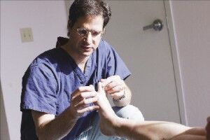 Raising awareness: Dermatologist exposes ugly truth beneath tanned skin ...