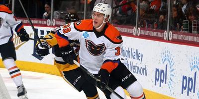 Professional hockey player, former Stone Bridge High School student ...