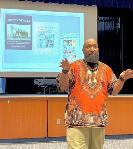 Historian and author Kevin Grigsby tells students the importance of ...