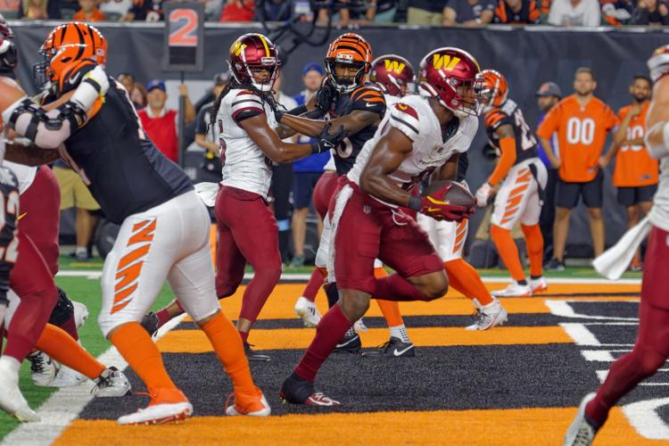 PHOTOS: Commanders light up scoreboard in 38-33 win over Bengals ...