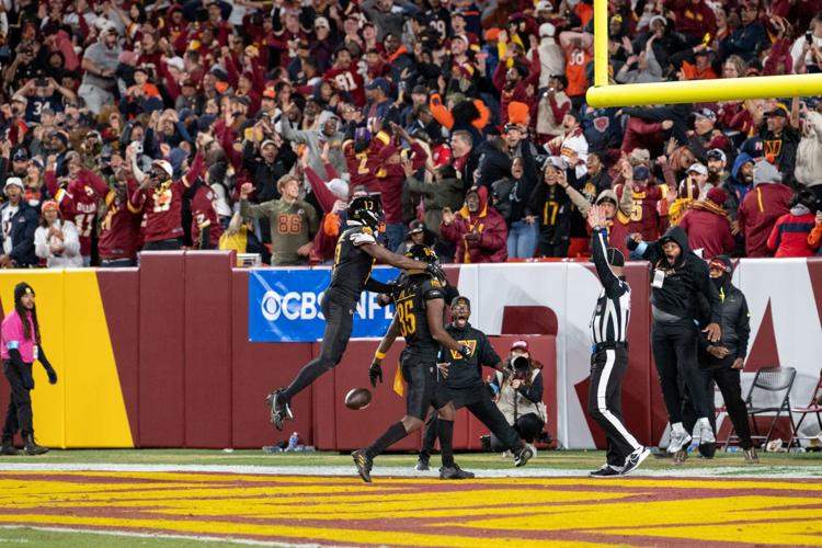 PHOTOS: Last-second Hail Mary lifts Commanders to 18-15 win over Bears ...