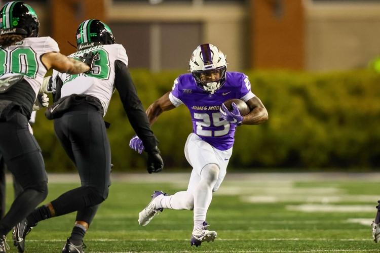 PHOTOS: Marshall outlasts James Madison 35-33 in double overtime ...