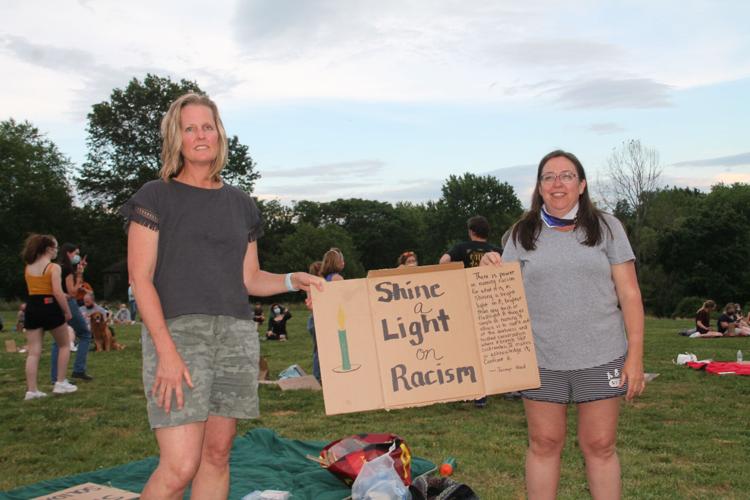 Several hundred people turn out in Round Hill for peaceful protest ...