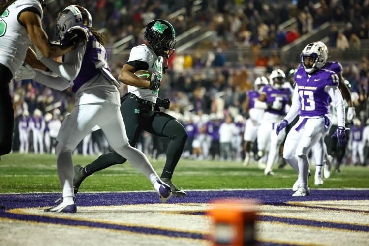PHOTOS: Marshall outlasts James Madison 35-33 in double overtime ...