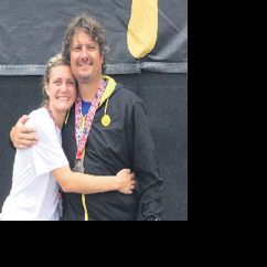 All Smiles: Father-daughter duo helps team at nationals | Sports ...