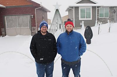 Welu and Holm mix tech and holiday cheer for Mad Lights display | News ...