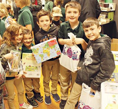 St. Thomas spreads joys of reading at book parade | News ...