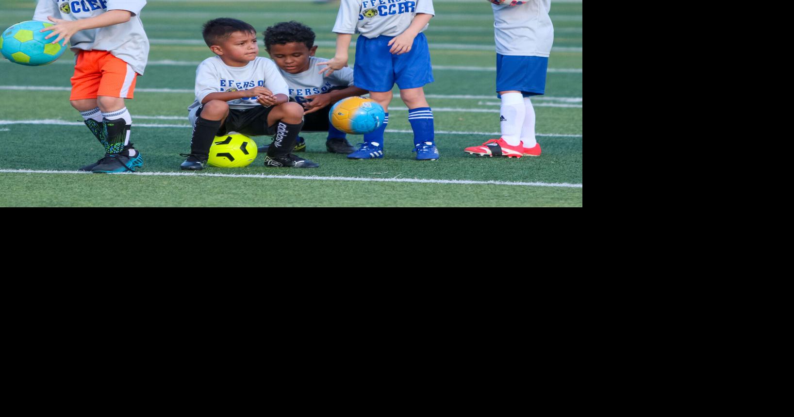 Dragons coach youth on summer soccer skills during camp at Jefferson ...