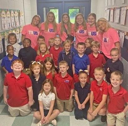 JHS volleyball players brighten JES car-rider line | School ...