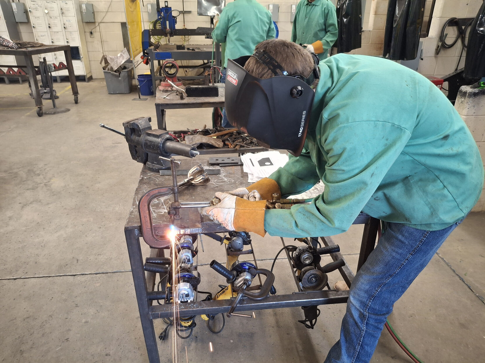 Auto-darkening helmets transform Madison County students' welding ...