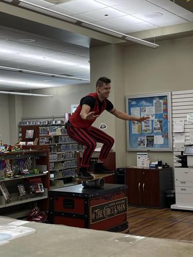 The Circus Man wows the crowd at the library | Photos & Videos ...