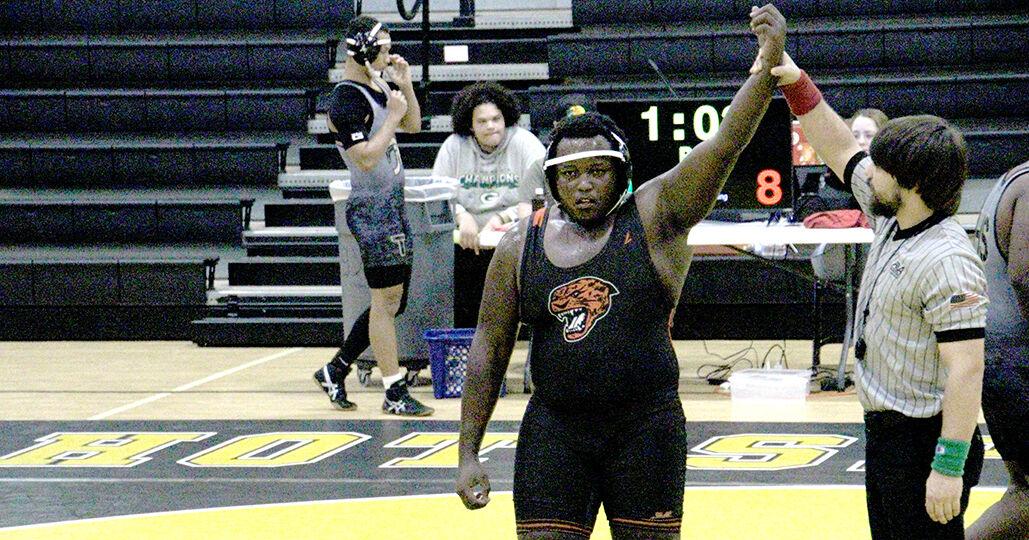 Leopard wrestlers bring toughness to the mat against Trojans; Malvern ...