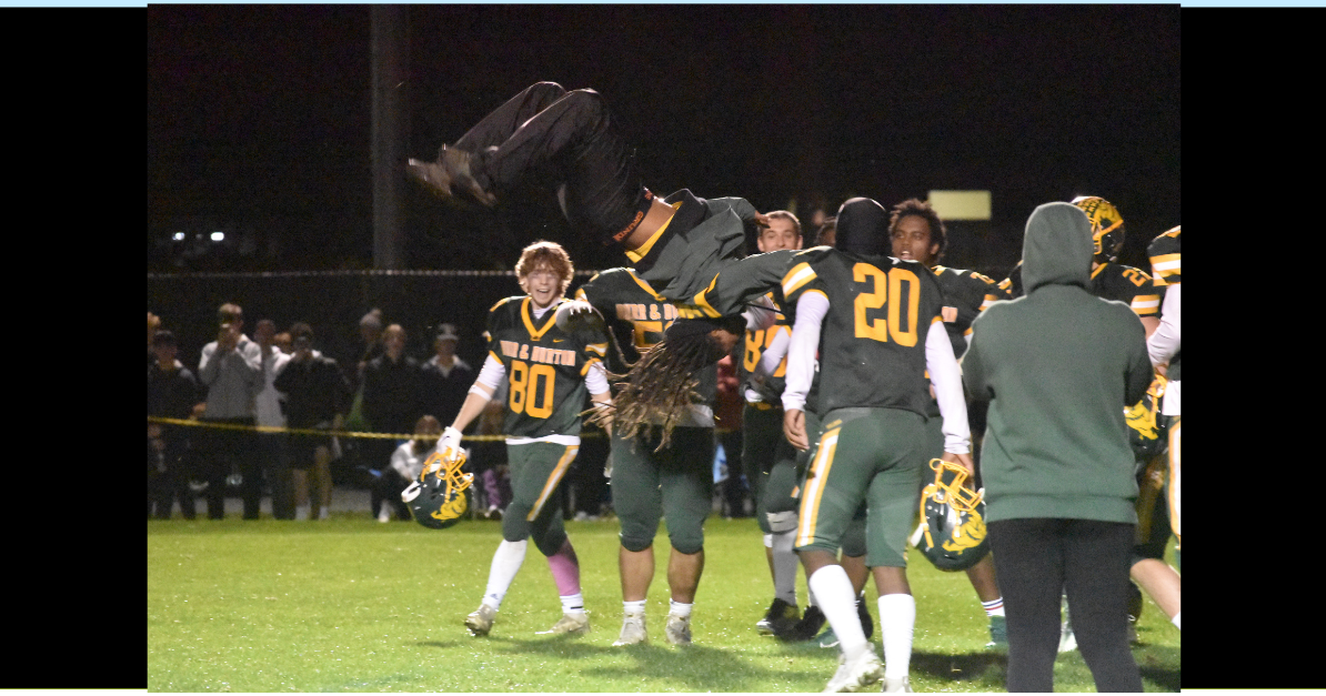 Burr and Burton football coach's backflips energize team | Sports ...