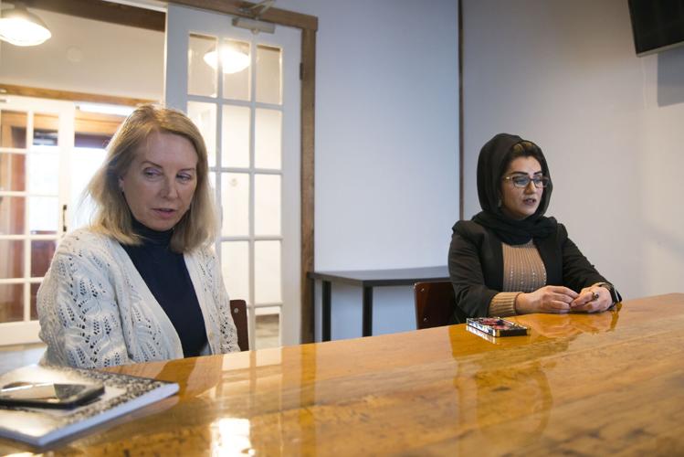 Afghanistan native Sadina Rasooli arrives to help refugees make ...