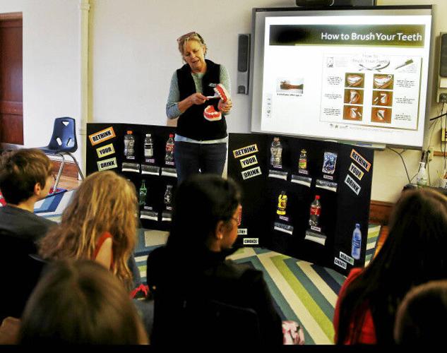 Dr. Brushy-Flossy teaches students about proper oral hygiene | Local ...