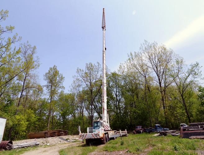 Crane appears on site where proposed cell phone tower would be built ...