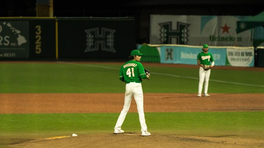 When it rains, it pours; 'Bows over Holy Cross 12-1 | Ka Leo | manoanow.org