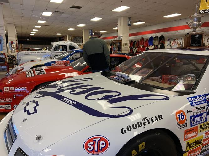 Race fans talk moonshine and eat hot dogs