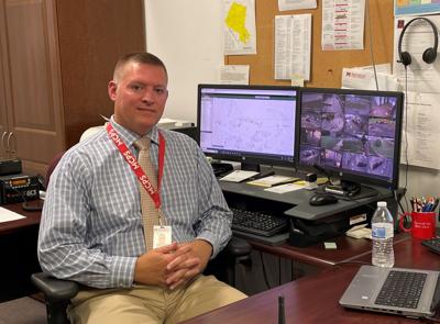 Slaughter, a graduate of city schools, oversees their security