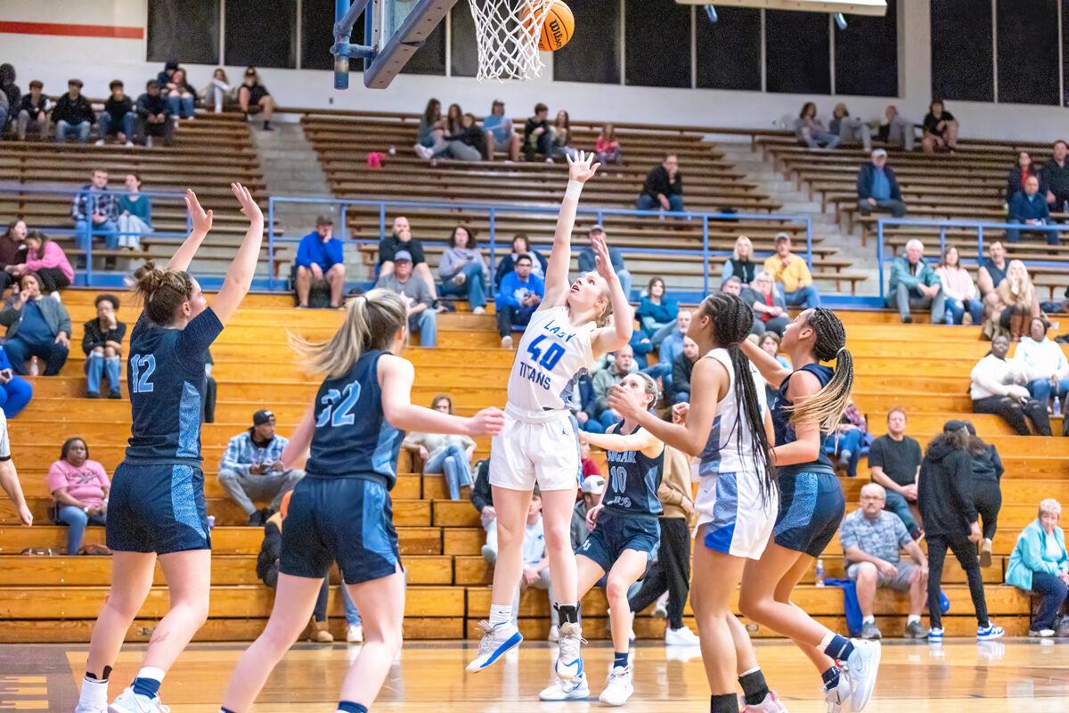 Lady Titans defense spectacular in a road win at Erwin