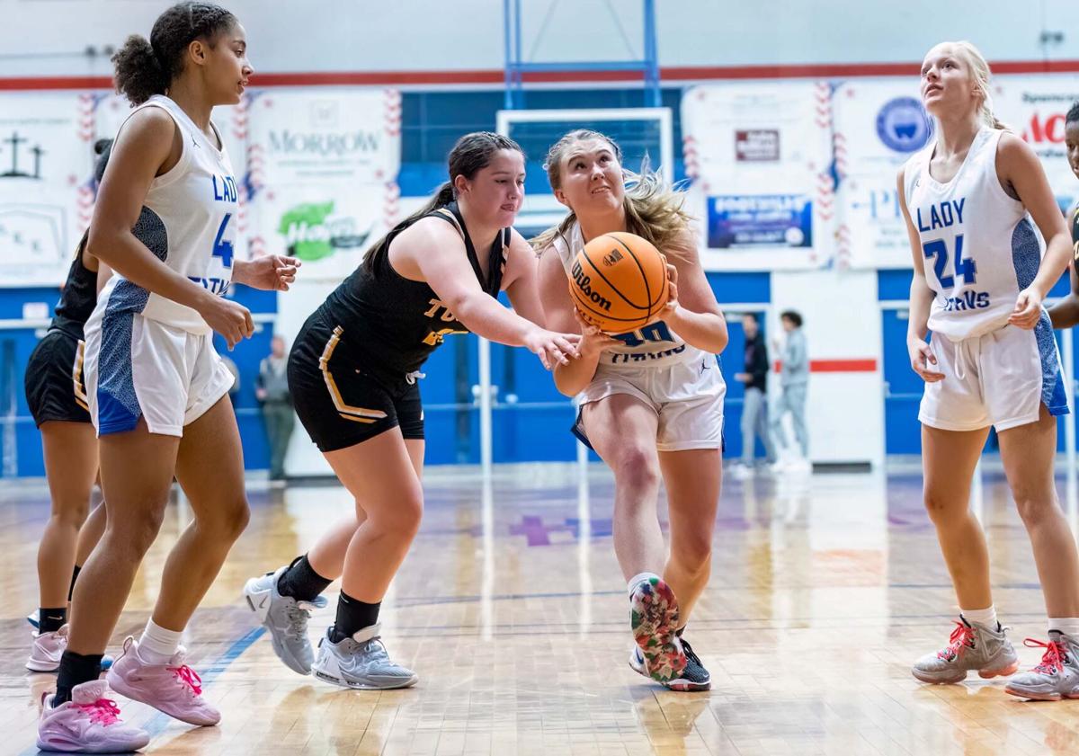 Lady Titans crush Mountaineers with yet another defensive gem