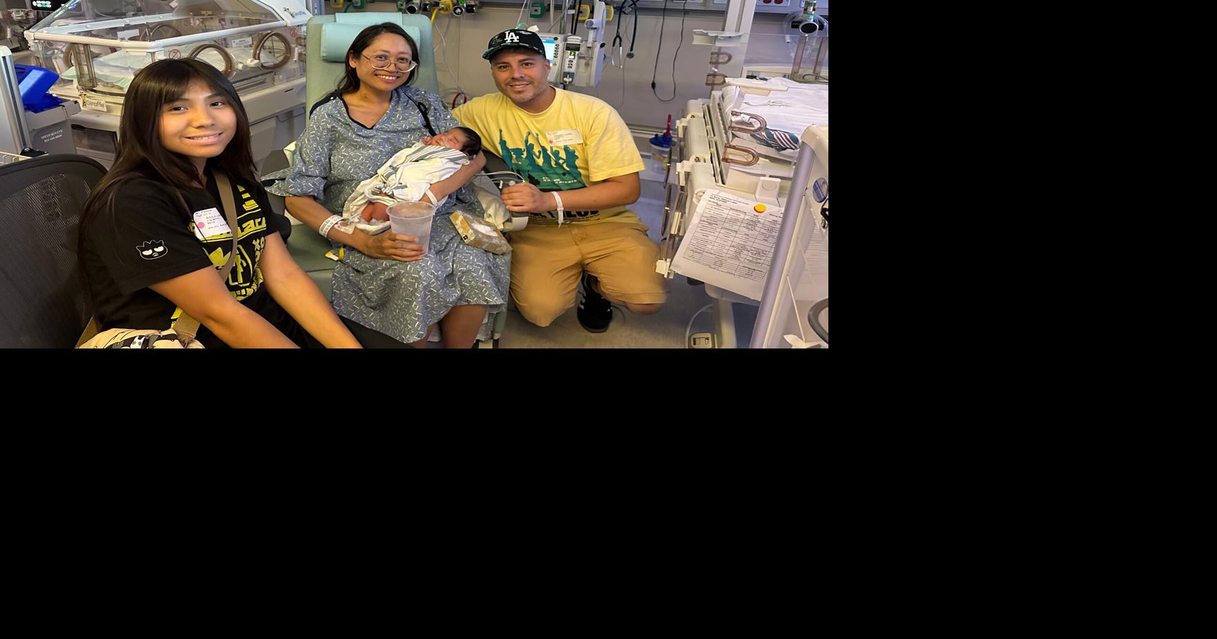 Woman gives birth to baby hidden by ovarian cyst