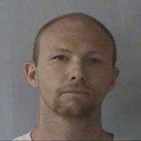 Marion police: Man chokes mother, hits her with canned food