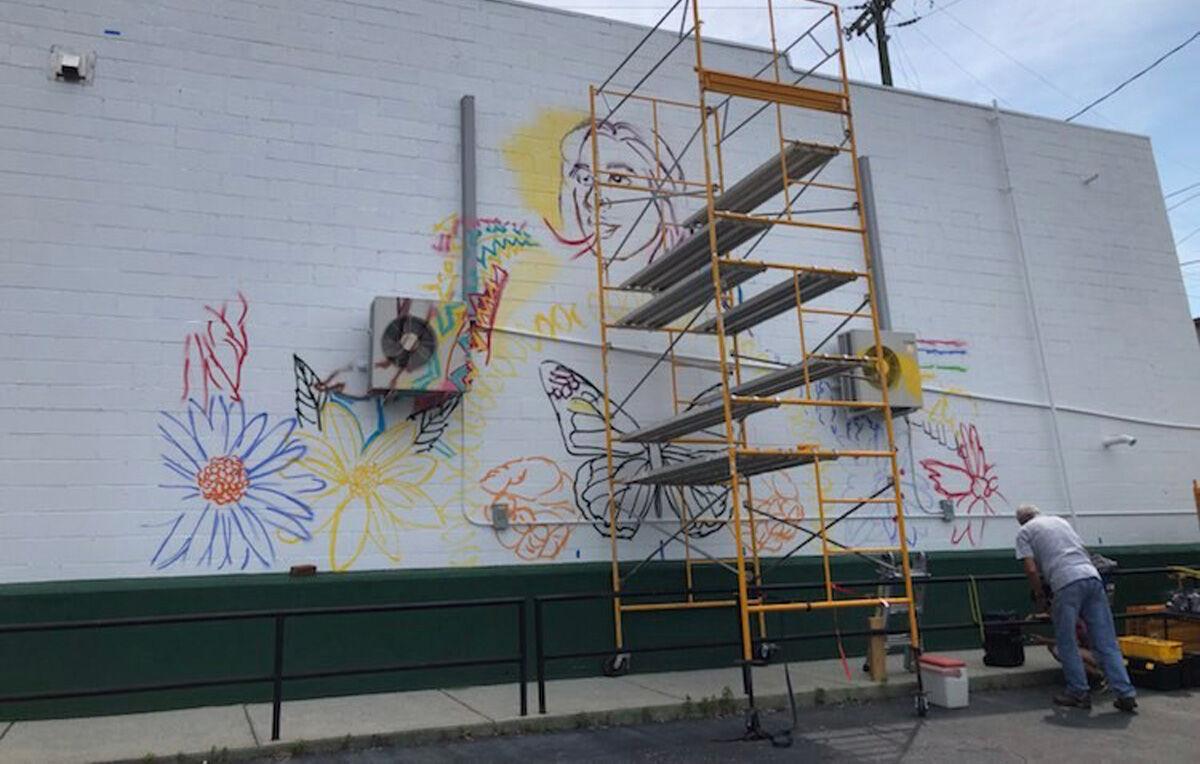 New mural underway for Mica Town’s building in Marion.