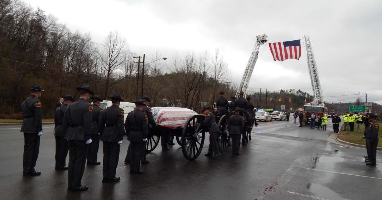 Memorial service honors Jason Crisp, his dog Maros