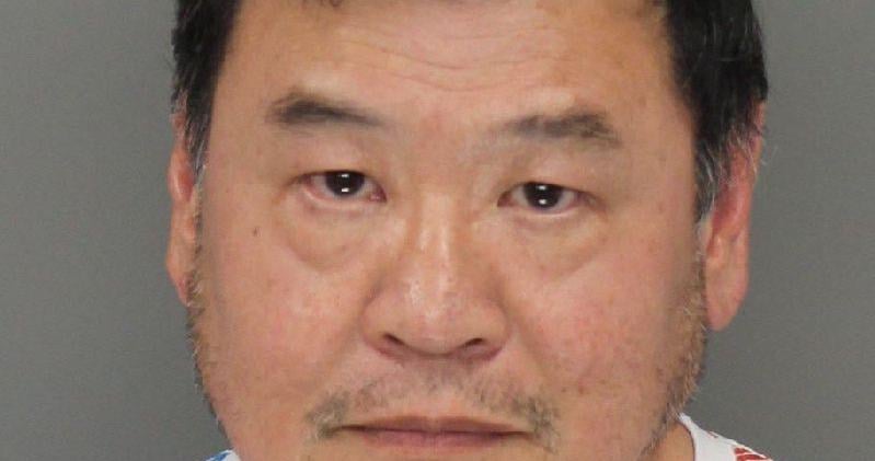 Man caught on video spraying Raid on food in air fryer, police say ...