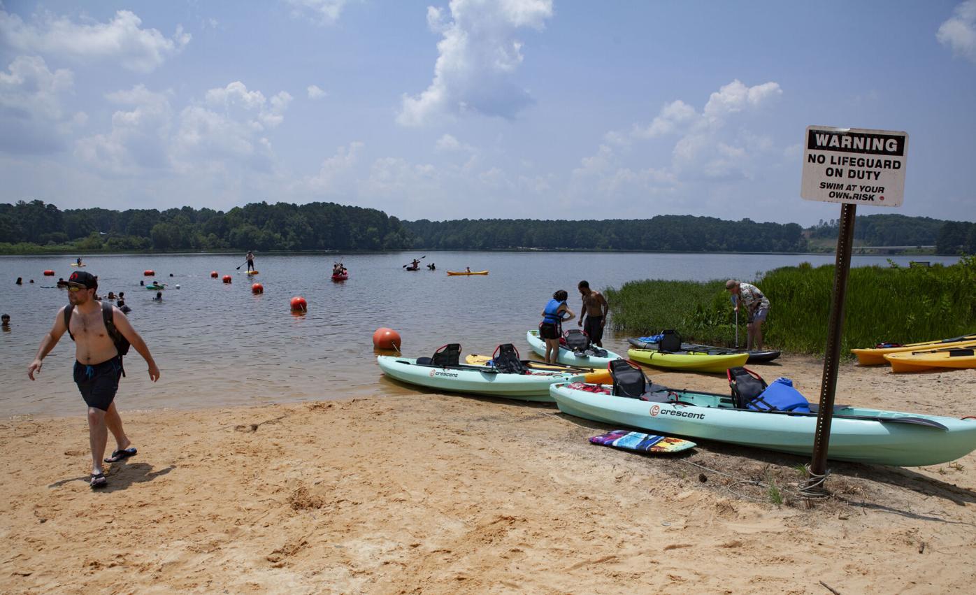 PHOTOS: Sunbathers, swimmers and boaters flock to Acworth Beach on a ...